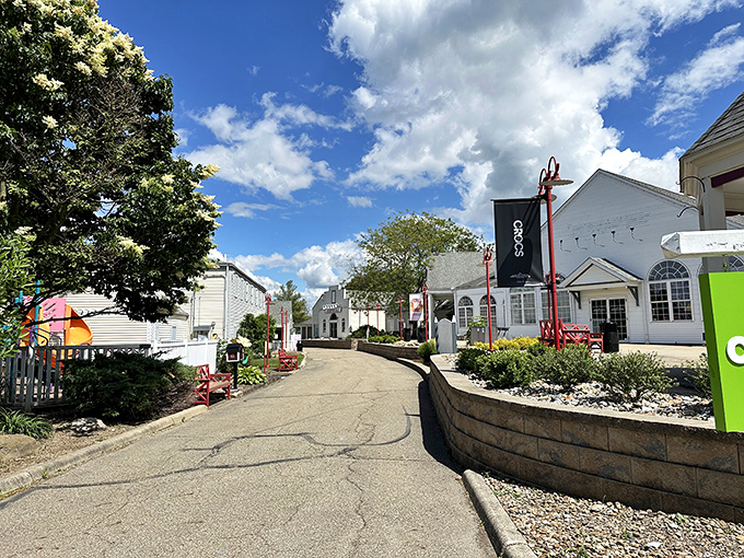 Strolling down this charming pathway feels like wandering through a quaint New England village—if that village happened to be having the sale of the century.
