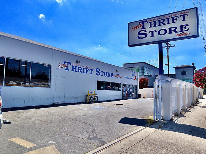 The unassuming exterior belies the wonderland within. Like a secret clubhouse for bargain hunters, Super Thrift's blue sign beckons with promises of affordable treasures.