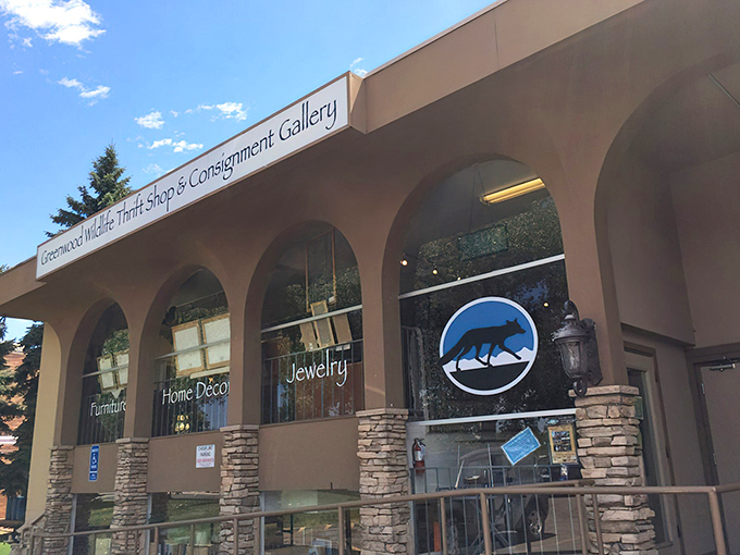 The Southwestern-style fa&ccedil;ade isn't just pretty&mdash;it's a portal to treasure hunting with purpose. Every purchase helps Colorado's wildlife rehabilitation efforts.