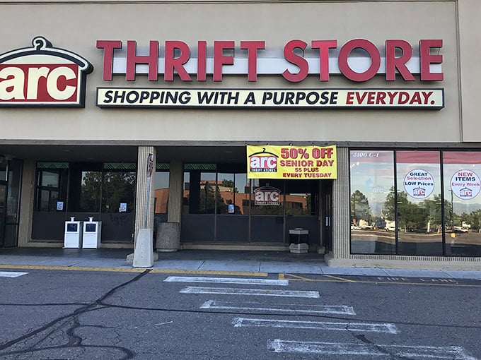 The iconic red signage of arc Thrift Store beckons like a retail oasis in the desert of overpriced shopping. Senior Day discounts await the savvy treasure hunter!
