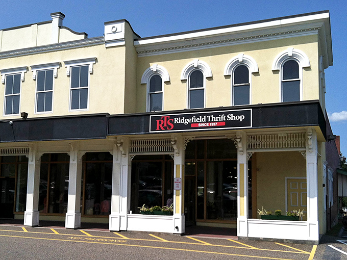 The historic fa&ccedil;ade of Ridgefield Thrift Shop stands proudly on Main Street, its cream-colored walls and arched windows promising treasures within.