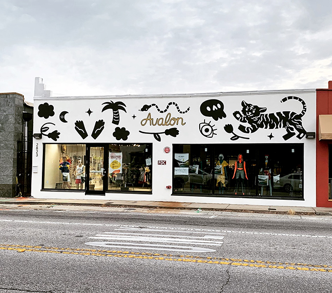 That playful mural with the striped tiger isn't just decoration &ndash; it's your first hint that this isn't ordinary thrift shopping.