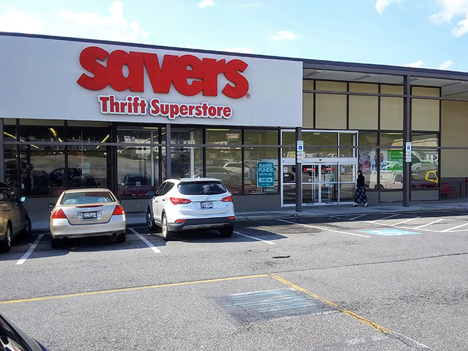 The iconic red Savers sign beckons like a lighthouse for bargain hunters. Step inside and prepare for a treasure hunt unlike any other.