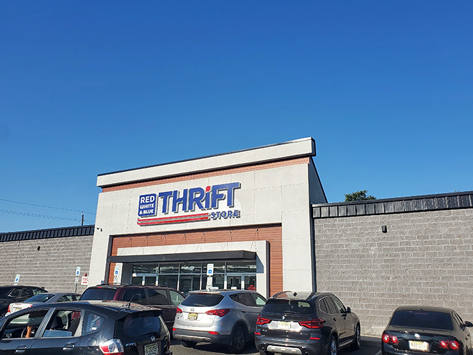 The unassuming facade of Red White & Blue Thrift Store &ndash; like finding a treasure chest disguised as an ordinary box, this patriotic portal promises adventures in secondhand splendor.