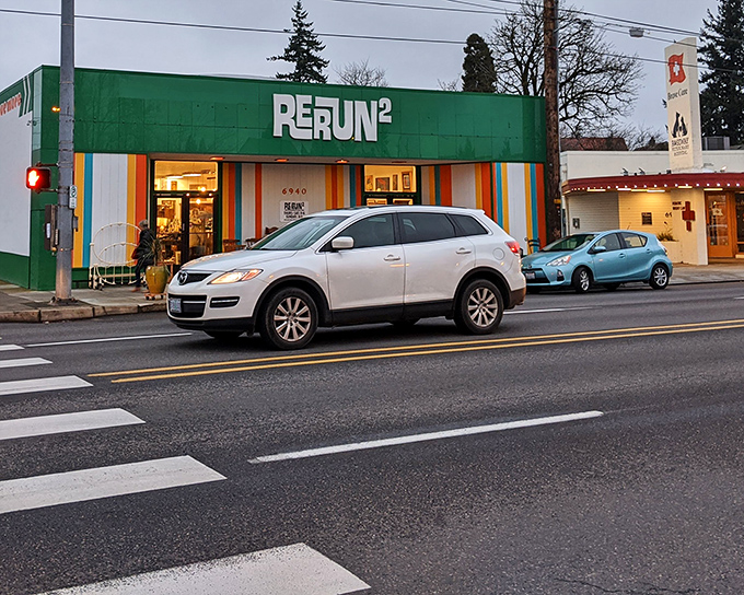 RERUN's vibrant green exterior with rainbow stripes isn't just eye-catching&mdash;it's a preview of the colorful treasures waiting inside this Portland secondhand paradise.