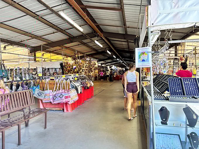 Endless aisles of treasures await as shoppers explore Mesa Market's covered walkways, where handbags meet jewelry in bargain-hunter's paradise.