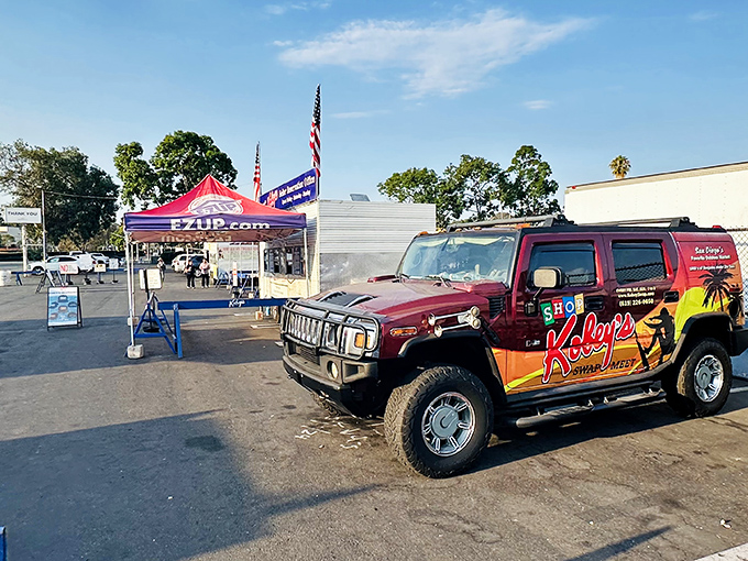 The official Kobey's Hummer &ndash; part vehicle, part mobile billboard &ndash; stands guard at the entrance like a carnival barker with four-wheel drive.