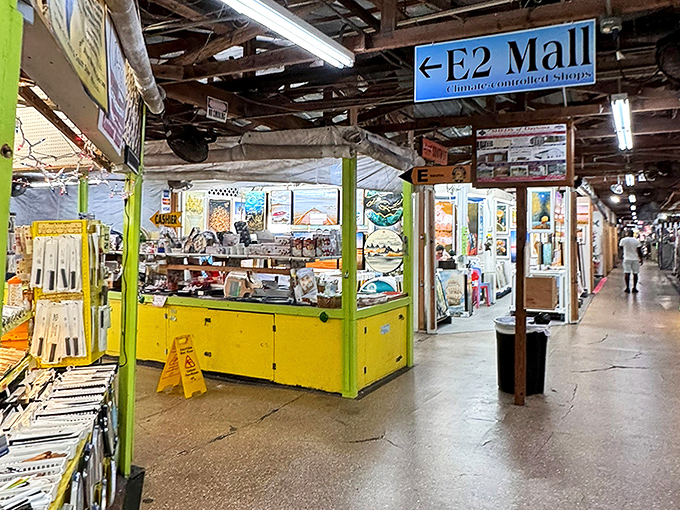 The E2 Mall corridor beckons with its bright yellow booths and endless possibilities&mdash;like a treasure map where X marks every spot.