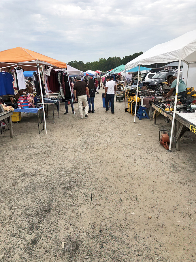 The outdoor section buzzes with weekend warriors navigating a maze of tents, where one person's castoffs become another's treasures.