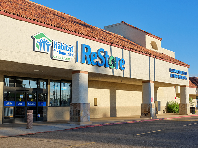 The Spanish-style roof and bright blue sign greet bargain hunters like a friendly beacon—where saving money and supporting the community go hand in hand.