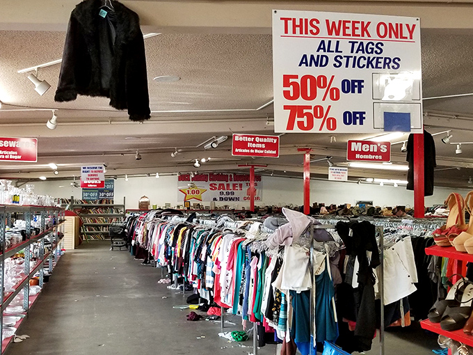 That black fur jacket hanging above might be someone's "one that got away" – thrift store rule #1: grab it before someone else does!