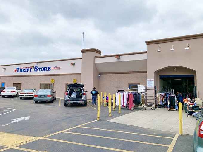 Merchandise spills out onto the sidewalk, a preview of the abundance waiting inside. Thrift shopping isn't just a hobby—it's an adventure.