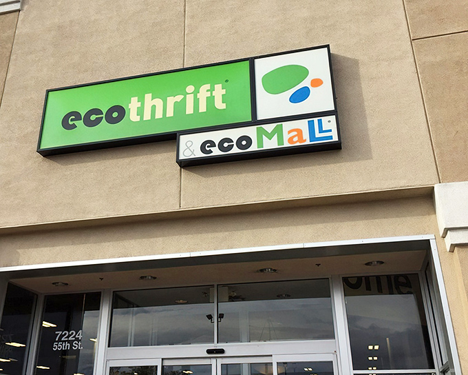 The distinctive green Eco Thrift sign beckons treasure hunters to Sacramento's ultimate secondhand paradise, where adventures await inside.