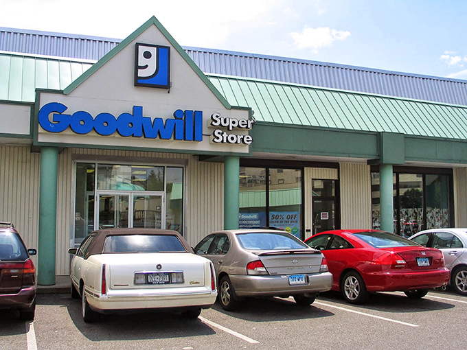 The green-trimmed exterior houses a treasure trove of second-hand gems, proving that one person's castoffs become another's fashion statement.