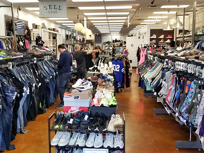 Welcome to treasure hunt headquarters! Uptown Cheapskate's bright, organized interior makes secondhand shopping feel like a boutique experience.