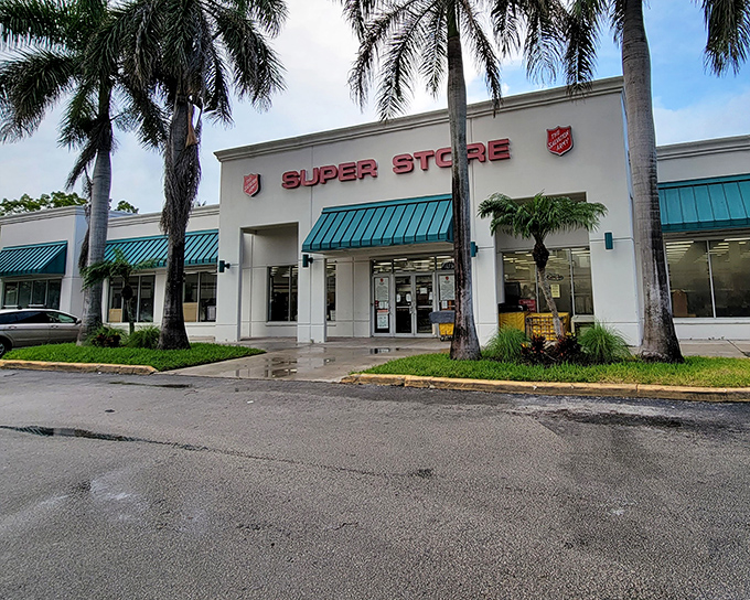 The Salvation Army Super Store stands proudly under Florida's blue skies, those teal awnings practically winking at bargain hunters like a tropical oasis of thrift.