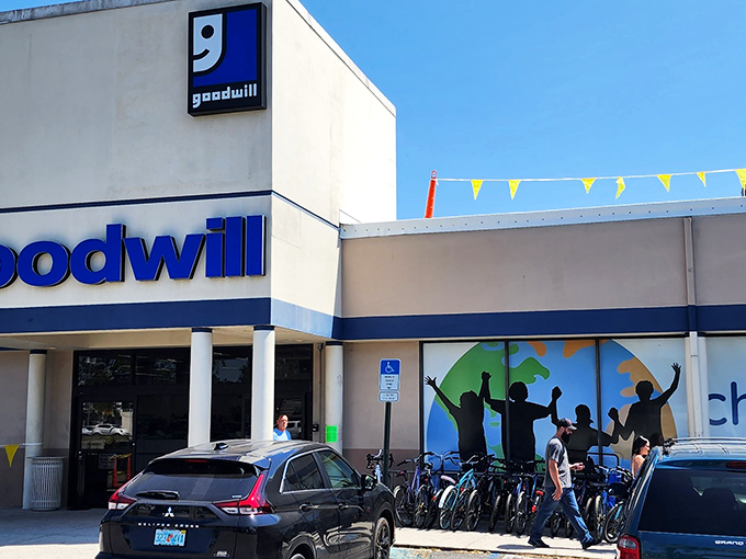 Yellow pennant flags flutter above the entrance like a permanent celebration of thrift, welcoming shoppers to this Tampa treasure trove.