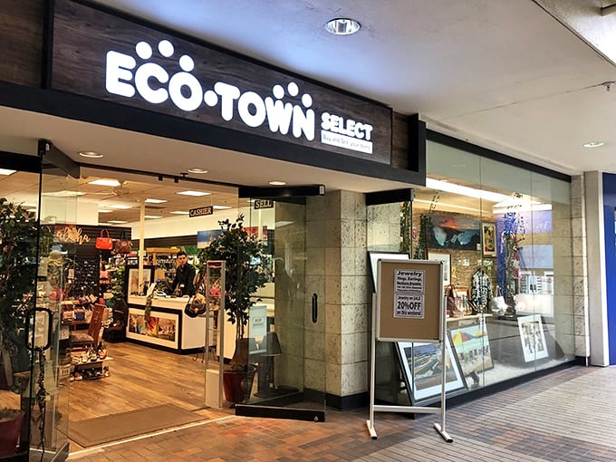 The storefront beckons like a portal to treasure-hunting paradise. Clean lines and modern signage hide the wonderland of secondhand gems waiting inside.