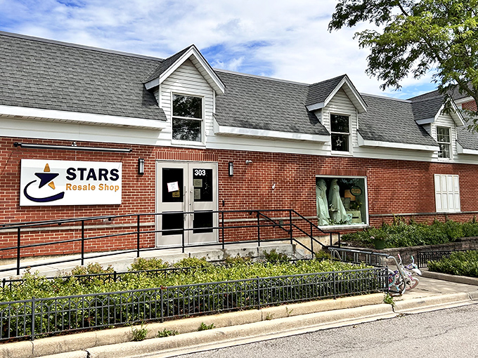 The unassuming brick exterior of STARS Resale Shop&mdash;where treasures hide behind modest walls like the world's most rewarding game of hide-and-seek.