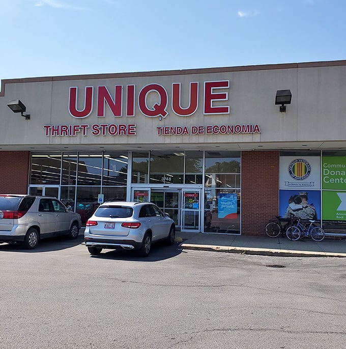 The red UNIQUE sign beckons like a lighthouse for bargain hunters, promising treasures that would make even minimalists weak at the knees.