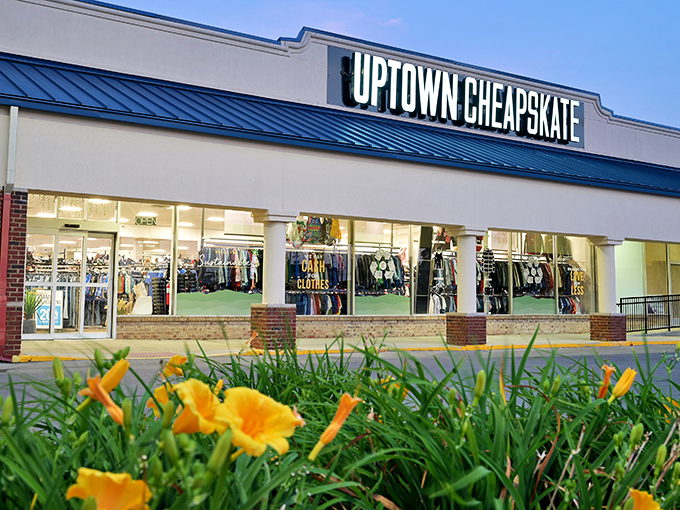 The iconic blue-trimmed storefront of Uptown Cheapskate glows like a beacon for bargain hunters in Lexington's retail landscape.
