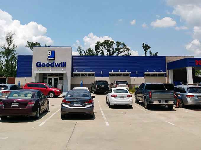 The blue-and-white facade of Goodwill Lake Charles stands like a beacon for treasure hunters. Behind those doors, adventures await!
