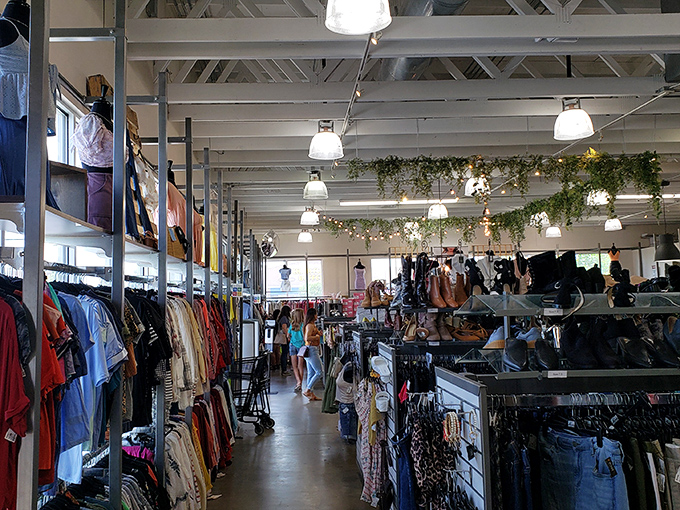 The retail promised land awaits! Uptown Cheapskate's spacious interior features exposed beams, pendant lighting, and enough fashion finds to make your credit card sigh with relief.