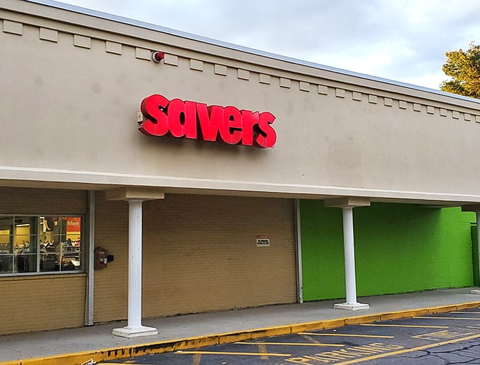 The iconic red Savers sign stands out like a beacon of bargain-hunting hope, promising treasures within those unassuming walls.