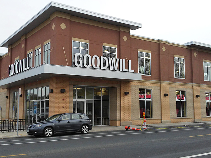 The modern brick exterior of Goodwill on Nicollet Avenue stands like a temple to thrift, beckoning bargain hunters with promises of treasures within.
