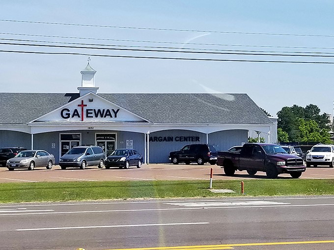 The church-like steeple and cross in Gateway's logo hint at its community mission, while the packed parking lot reveals its not-so-secret popularity.