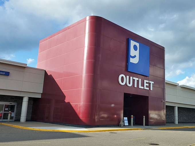 The unmistakable red cube with its cheerful blue smile logo stands like a beacon of bargain hope in Canton's retail landscape.