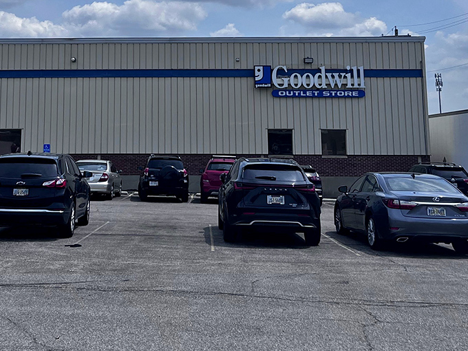 The unassuming exterior of Cincinnati's Goodwill Outlet Store – where treasure hunters know that retail magic happens not in fancy storefronts but in what lies within.