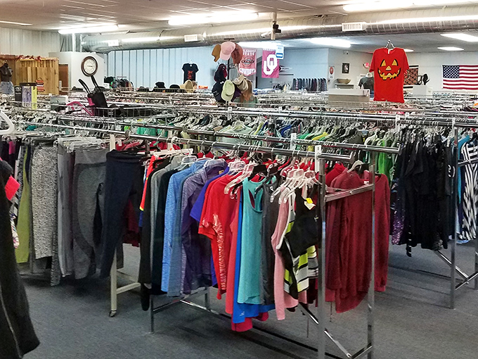 Racks upon racks of colorful clothing stretch into the distance like a textile treasure map waiting to be explored.