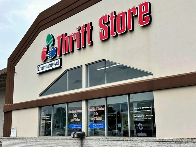 The bright trio of hands on CommunityAid&rsquo;s fa&ccedil;ade isn&rsquo;t just a logo&mdash;it&rsquo;s a friendly wave inviting you to a thrift-store treasure hunt inside.