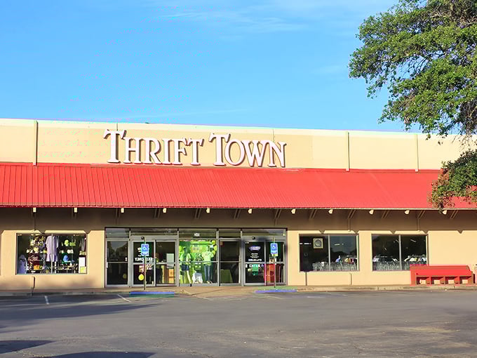 The iconic Thrift Town sign beckons bargain hunters like a desert oasis promises water. This beige building with red awning holds treasures beyond imagination.
