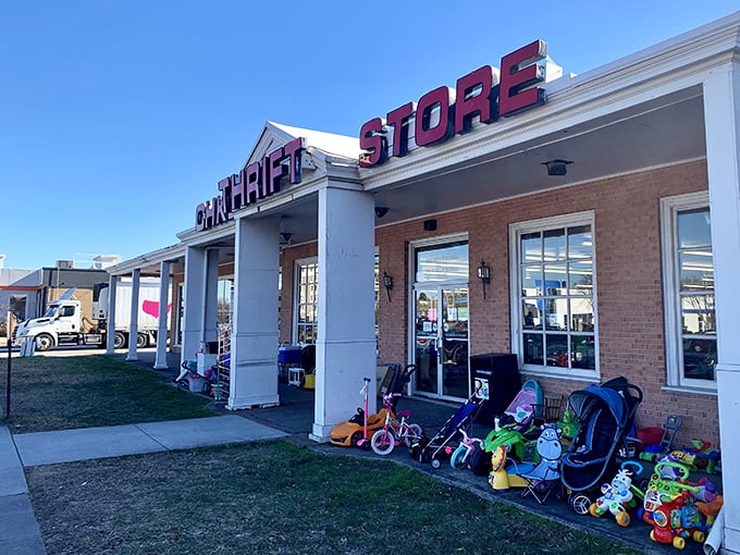 Sunshine illuminates the entrance where yesterday's toys await new adventures. That pink bicycle might just be someone's first set of wheels toward childhood freedom.