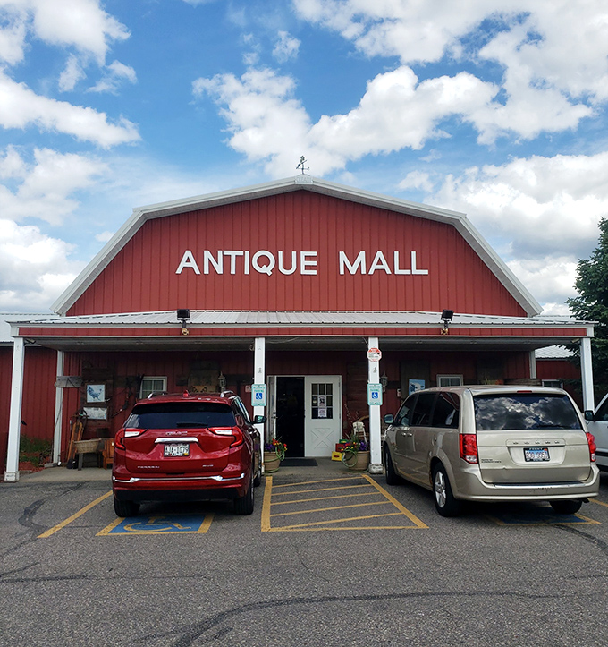 The iconic red barn exterior promises treasures within, like a vintage Christmas morning waiting to happen any day of the year.