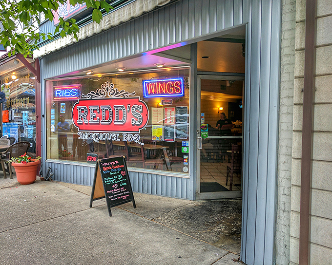 The neon glow of "RIBS" and "WINGS" in the window isn't just signage—it's a beacon of hope for the barbecue-deprived soul.