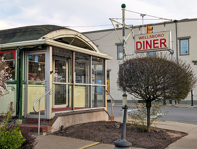 Like a time machine with a neon sign, the Wellsboro Diner's classic exterior promises authentic American comfort without a hint of irony.
