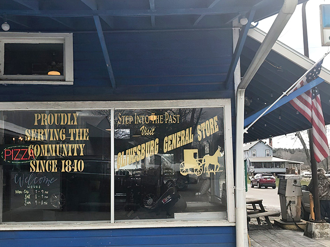 That cheerful blue exterior practically waves hello, promising the kind of comfort food that makes detours absolutely worth it.