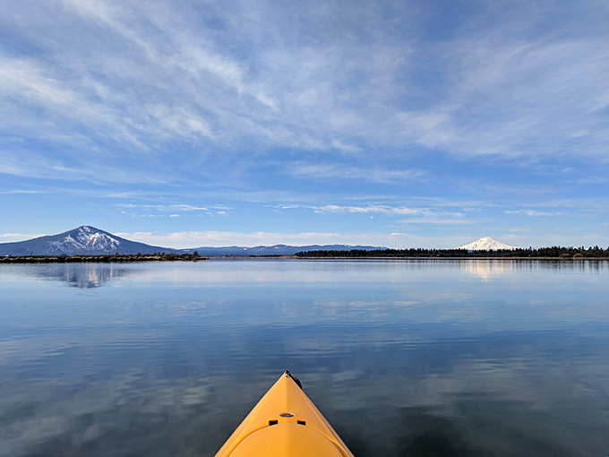 Mirror, mirror on the water &ndash; pine trees create perfect reflections in the crystal-clear springs that give this hidden California gem its name.