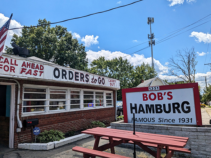 The iconic Bob's Hamburg sign stands proudly against an Akron sky, promising burgers that have satisfied Ohioans since FDR was president.
