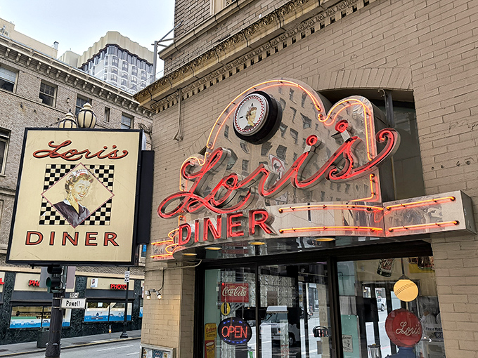 That neon glow isn't just lighting up Mason Street&mdash;it's a beacon calling all hungry time travelers to Lori's Diner, where nostalgia comes with a side of fries.