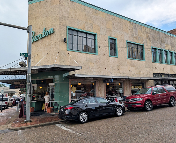 The historic Burton building houses this culinary gem, its mint-green trim and cream facade standing as proudly as the biscuits inside.