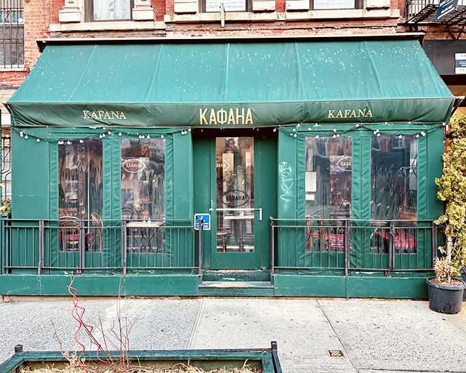 Kafana's iconic green awning stands like a portal to the Balkans, promising authentic Serbian flavors in the heart of Manhattan's East Village.
