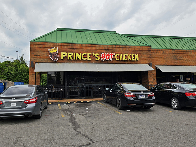 The unmistakable green roof and brick facade of Prince's Hot Chicken South beckons like a spicy siren call to Nashville locals and heat-seeking visitors alike.