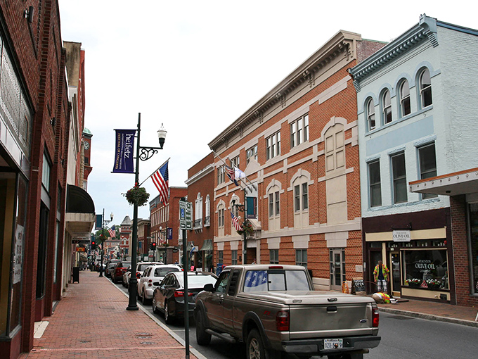Staunton's downtown stretches before you like a living postcard, where historic brick buildings stand shoulder-to-shoulder under blue Virginia skies.