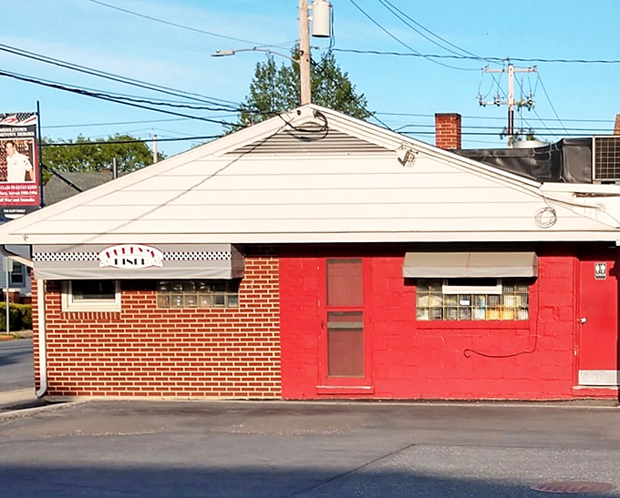 The unassuming red and brick exterior of Kuppy's Diner stands as a beacon of breakfast hope in Middletown, promising comfort food without pretension.