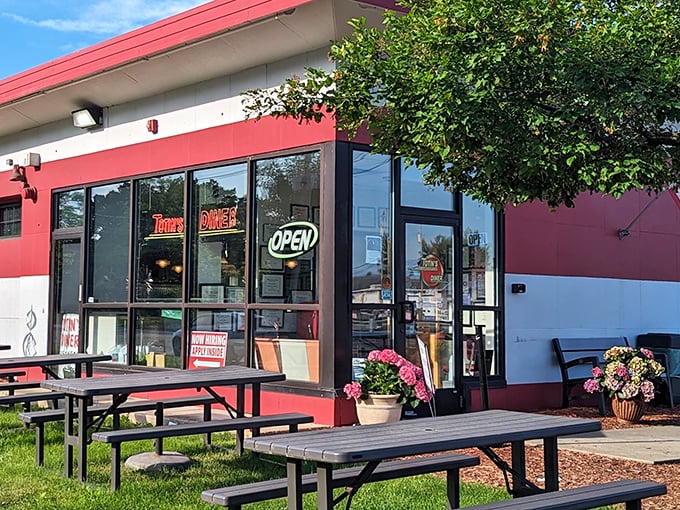 The bright red-and-white exterior of Totin's Diner stands out like a beacon for breakfast lovers. Simple, unassuming, and promising delicious things inside.