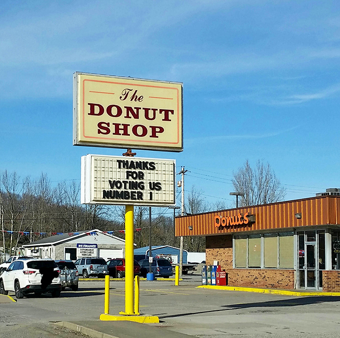 That classic roadside sign isn't just pointing you toward donuts—it's pointing you toward breakfast salvation in Buckhannon.